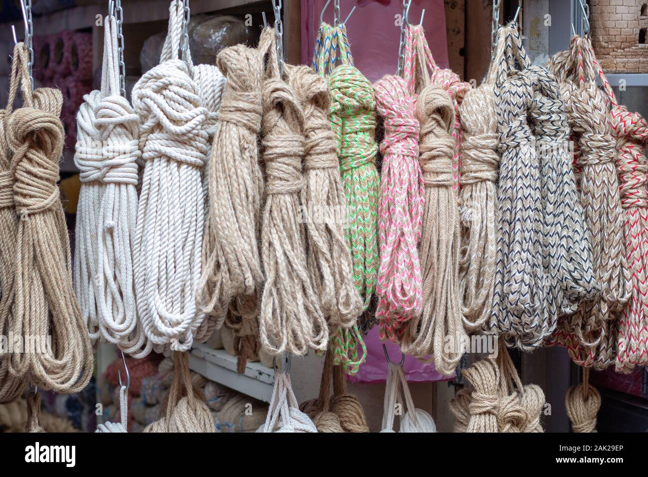 Colorful ropes twisted and hanged. It was taken in front of the store ...