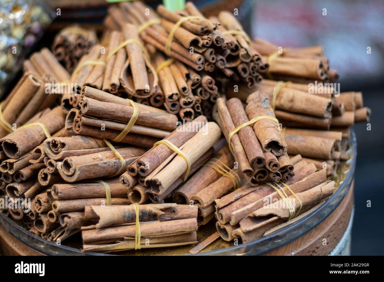 Cinnamon sticks close-up. They are wrapped with rope and sold Stock ...