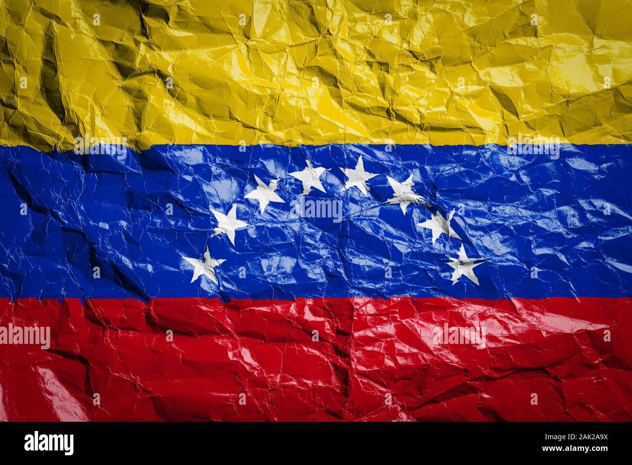 National flag of Venezuela on crumpled paper. Flag printed on a sheet ...