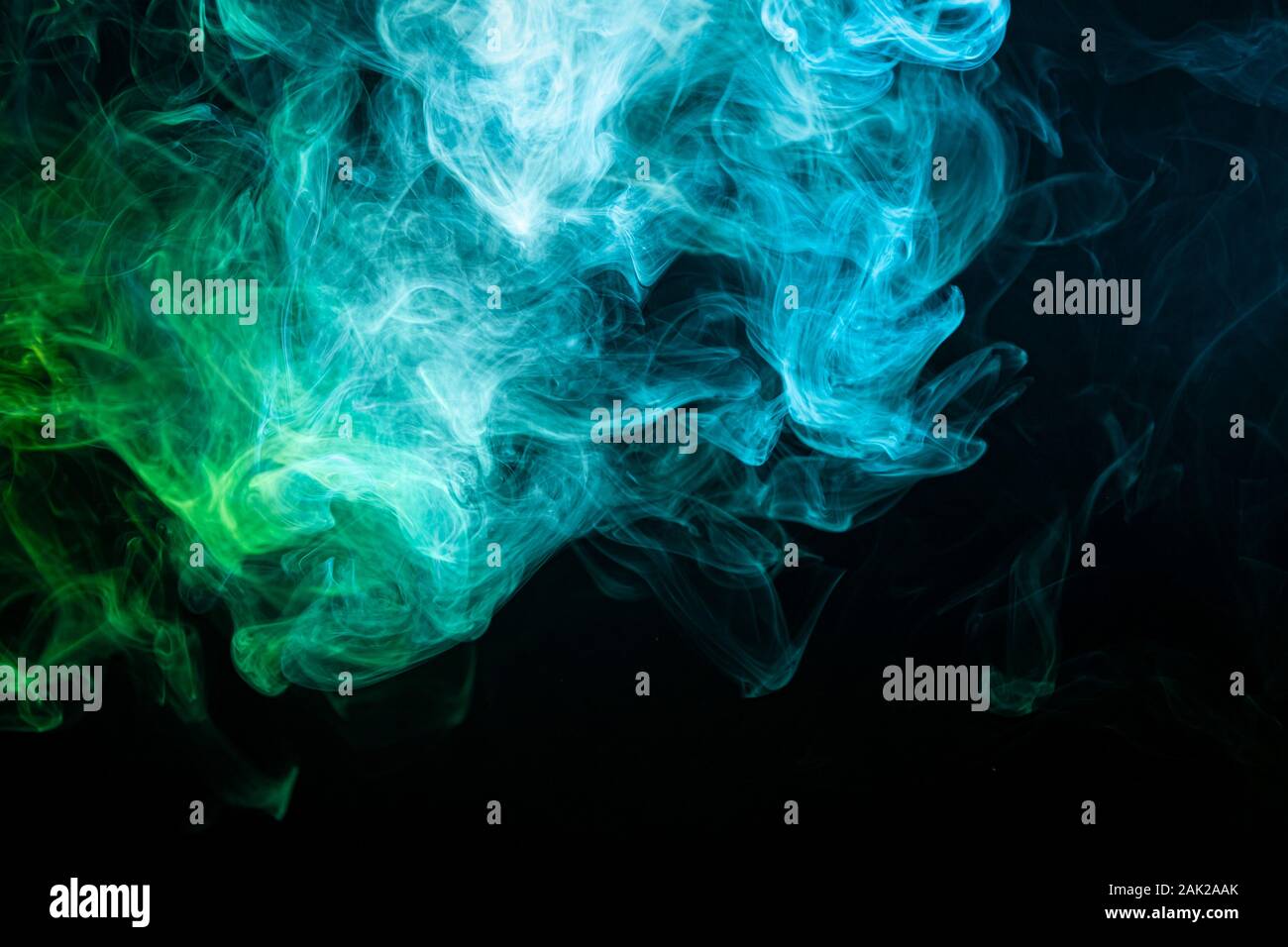 Frozen abstract movement of explosion smoke multiple colors on black ...