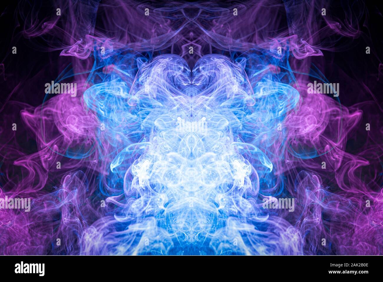 Smoke of pattern pink and blue in the form of horror monster on a dark ...