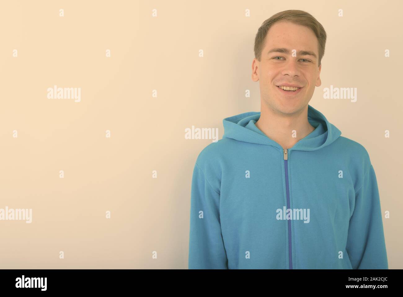 Person wearing blue hoodie hi-res stock photography and images - Alamy