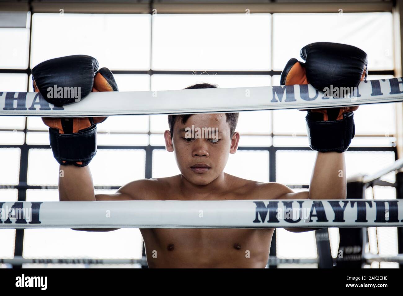 Boxer is holding a meditation rope on the Thai boxing ring Stock Photo ...