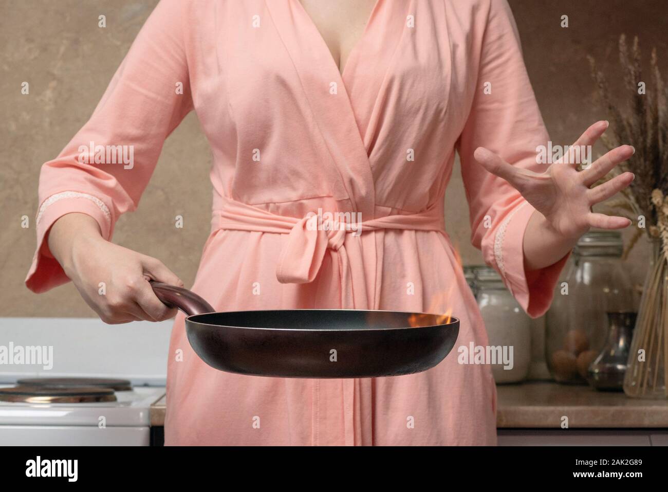 Confused woman cooking hi-res stock photography and images - Alamy