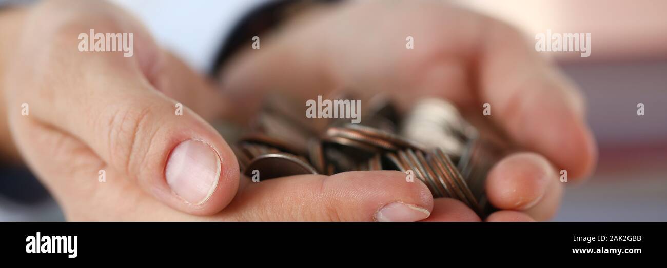 Hand businessman putting pin money Stock Photo - Alamy