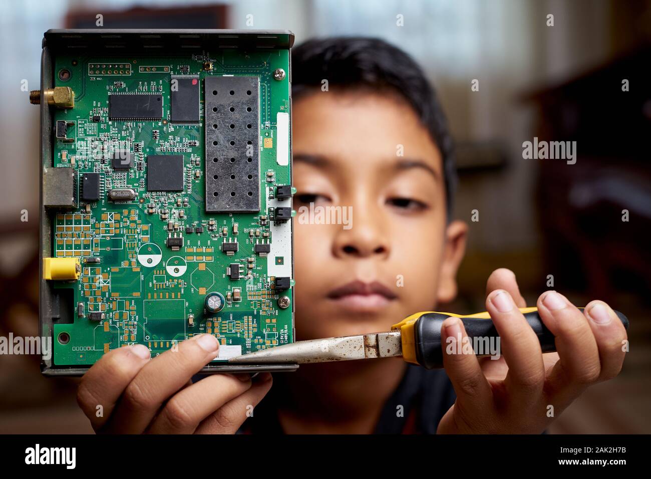 Cute Schoolboy half closed electronic circuit computer part Stock Photo ...