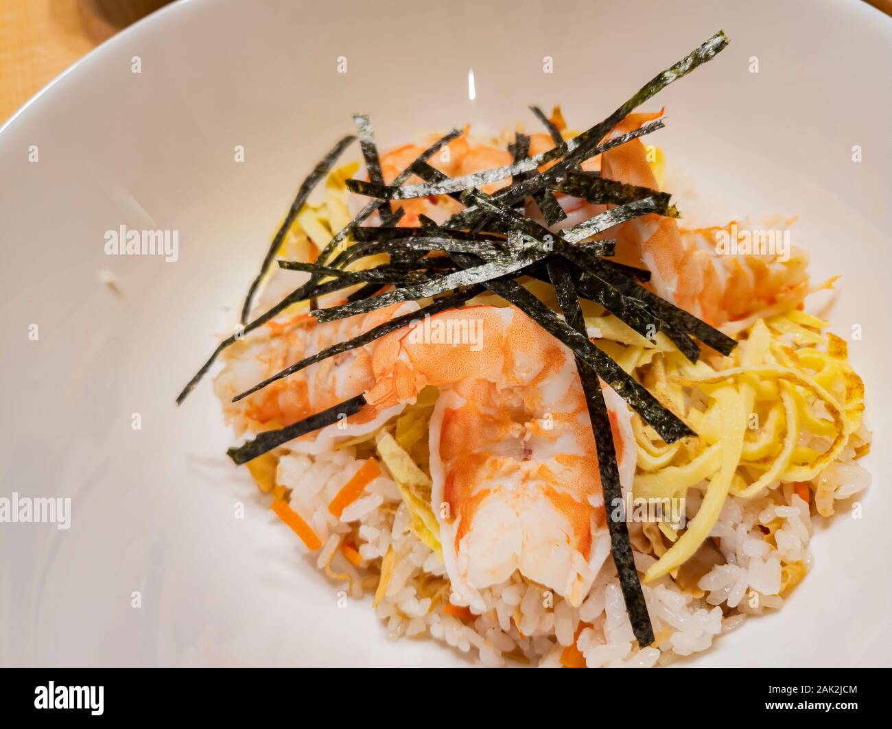 Close up shot of the cooking process of the Japanese style Chirashi ...