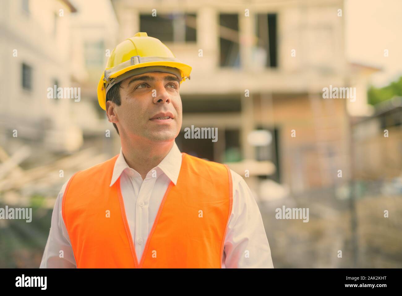 Handsome Persian man construction worker at the construction site Stock ...