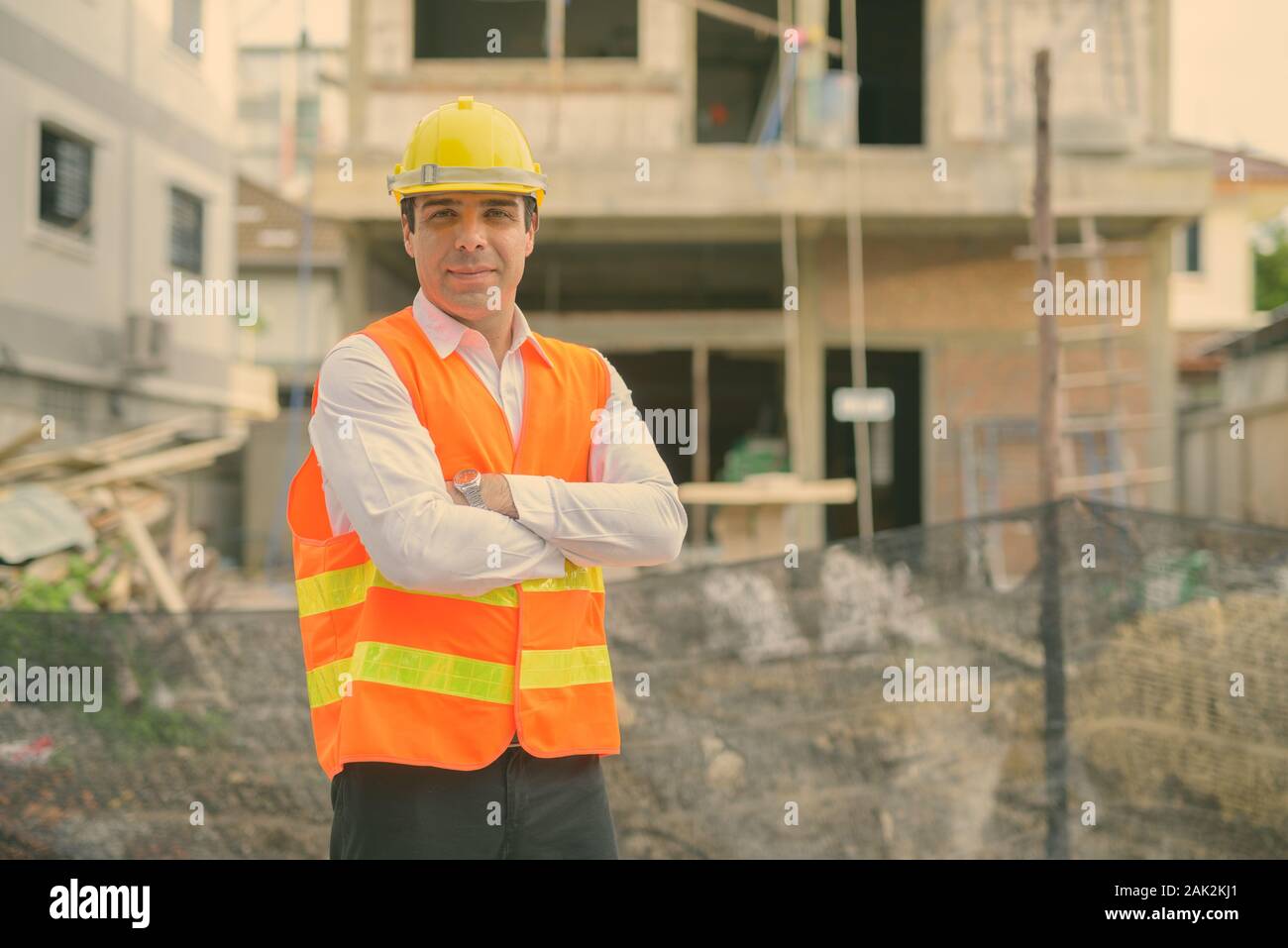 Handsome Persian man construction worker at the construction site Stock ...