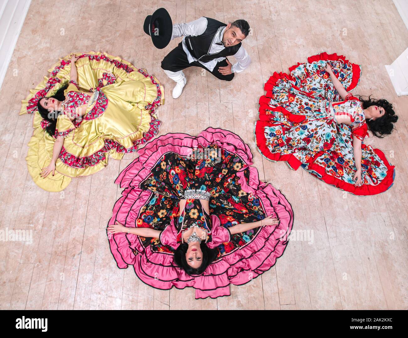 top view. dance group performing Gypsy folk dance Stock Photo - Alamy