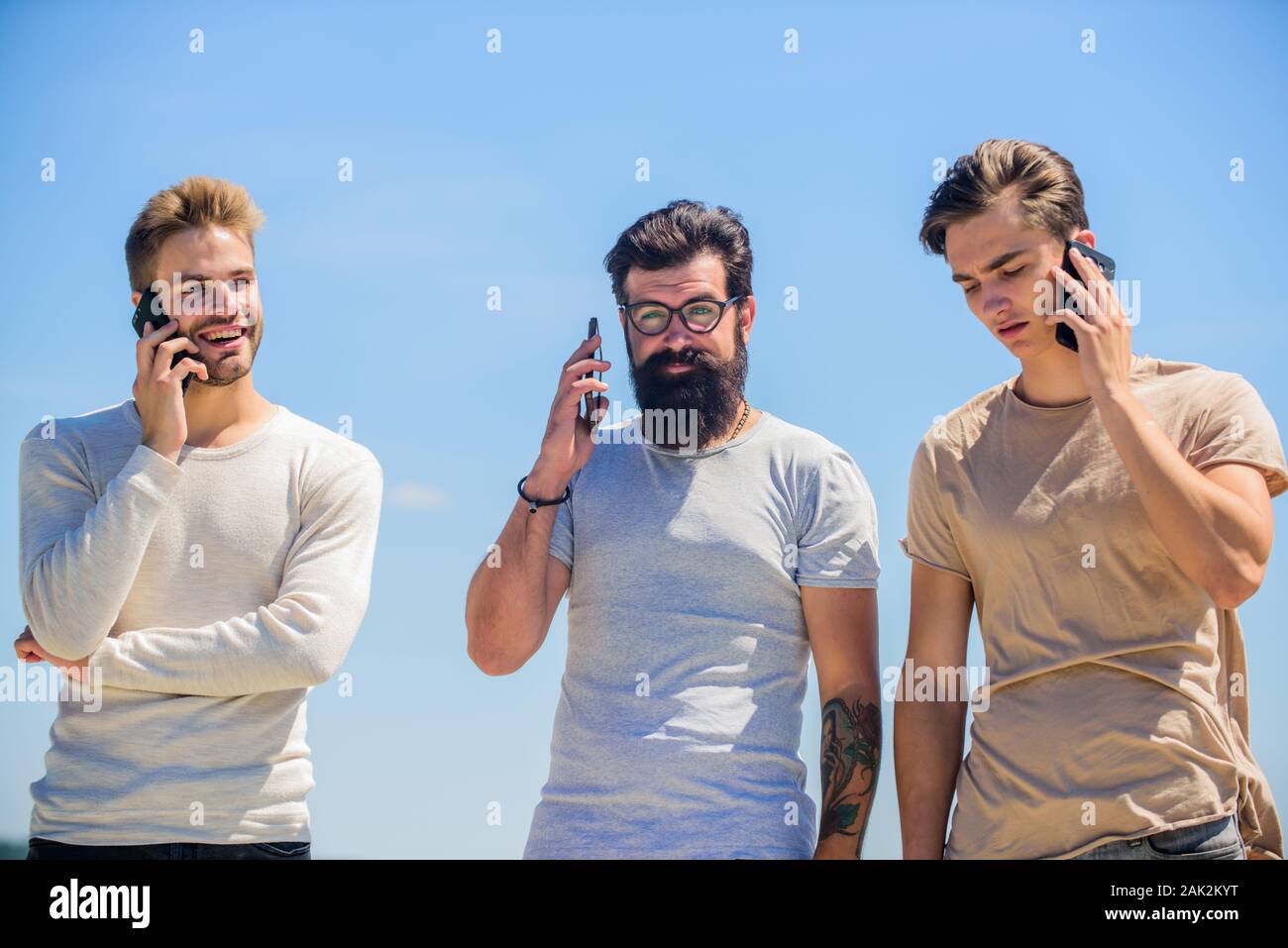 Mobile phone conversation. Friends chatting sky background. Mobile ...