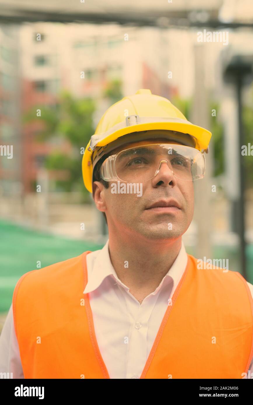 Handsome Persian man construction worker at the construction site Stock ...