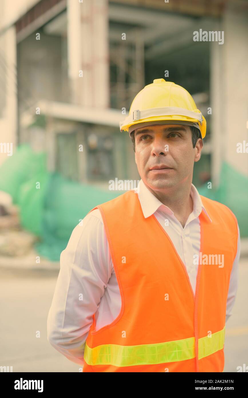 Handsome Persian man construction worker at the construction site Stock ...