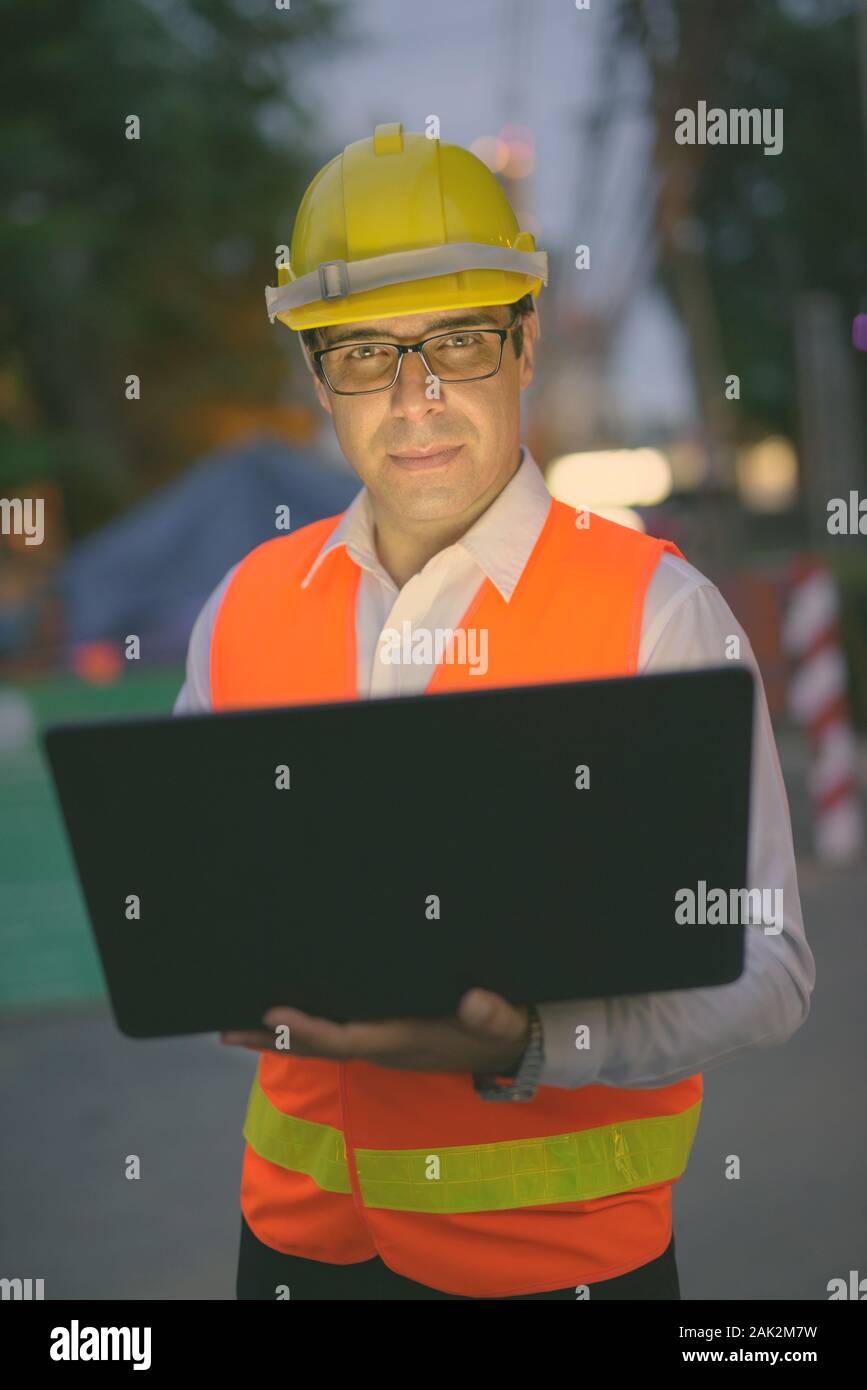 Handsome Persian man construction worker at the construction site at ...