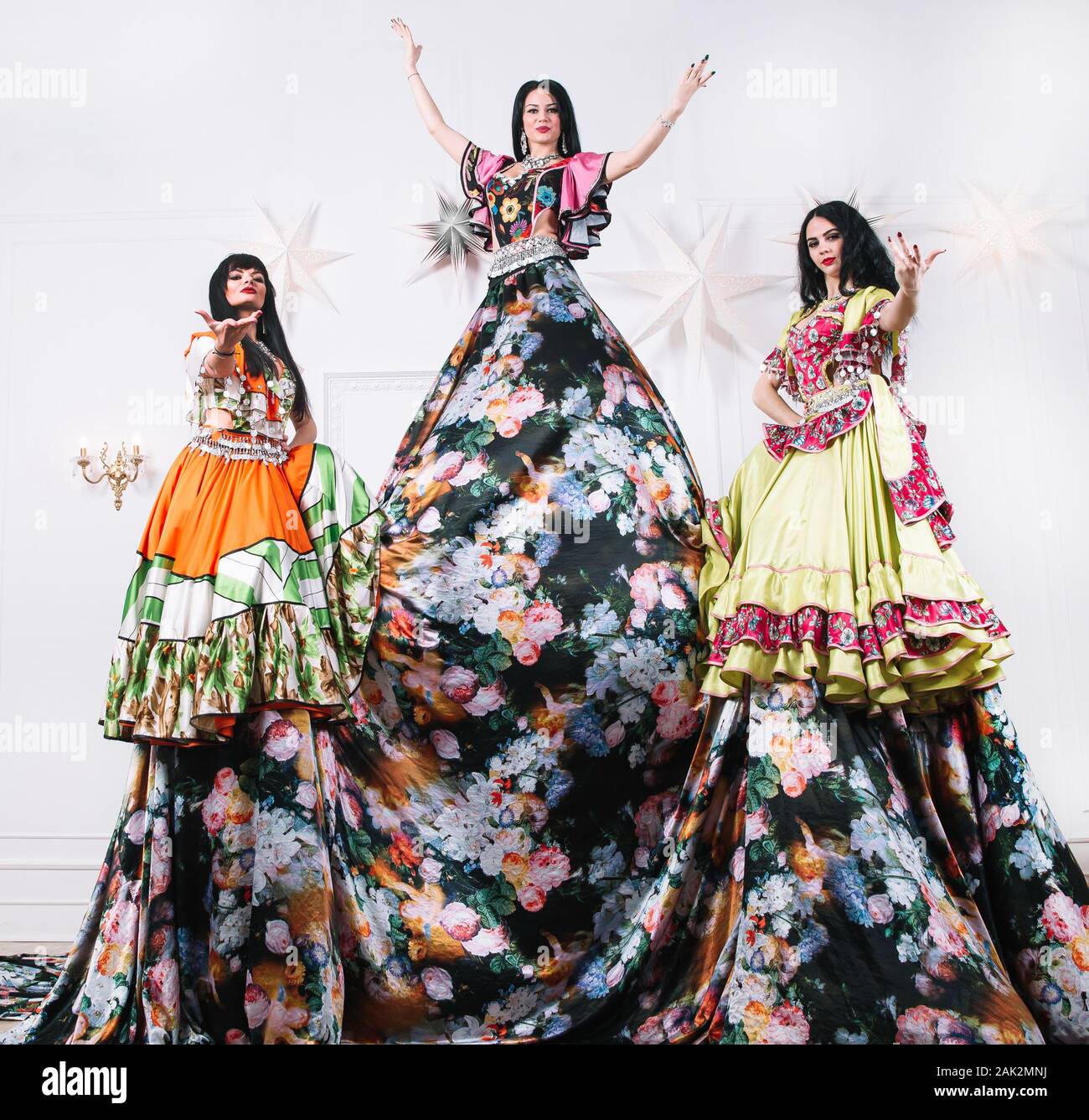 three female dancers in traditional Gypsy dresses Stock Photo - Alamy