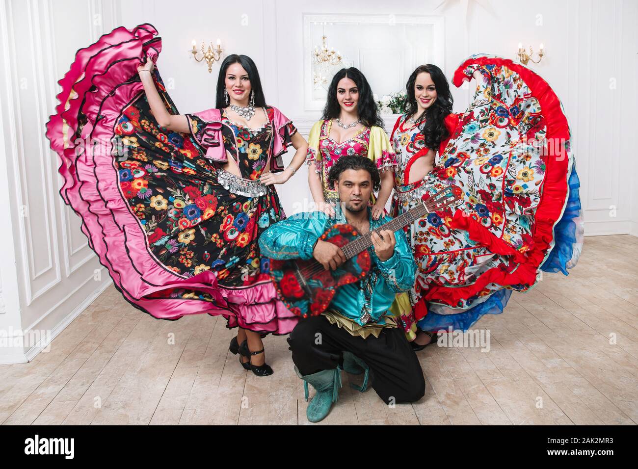 portrait Gypsy folk ensemble in traditional costumes Stock Photo - Alamy
