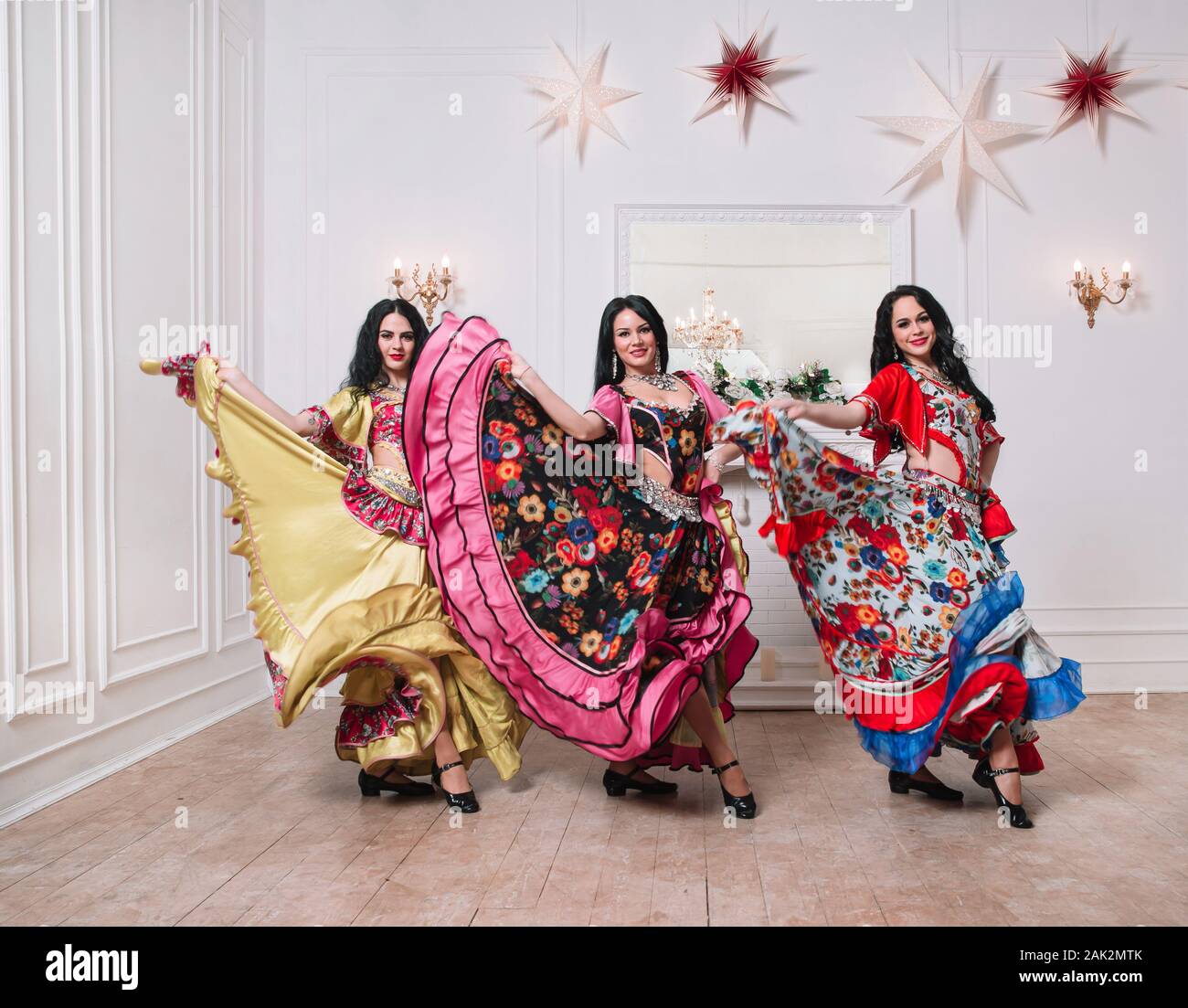 three attractive female dancers performing a Gypsy dance Stock Photo ...