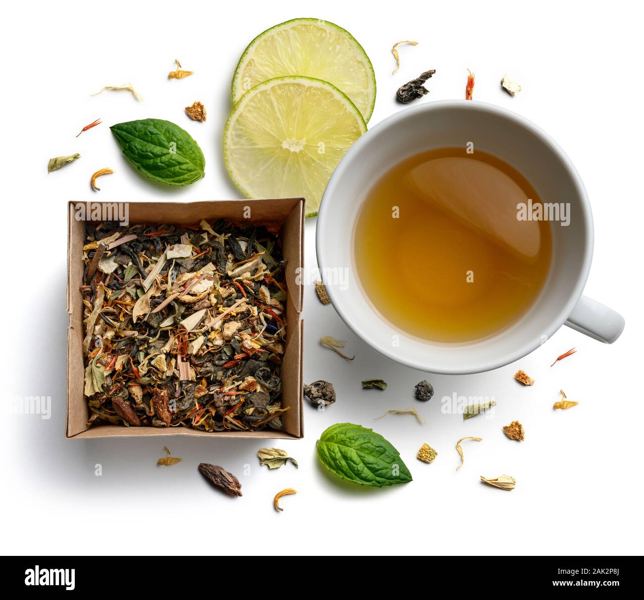 Green tea with natural aromatic additives and a cup. Top view on white ...