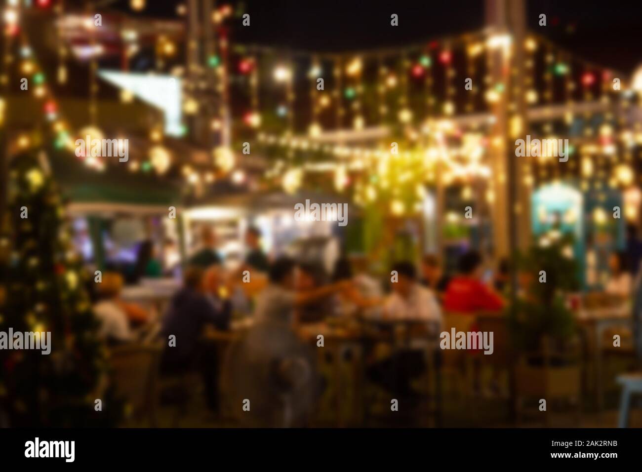 blurred image Lots of people enjoy at the bar pub fun of night festival ...