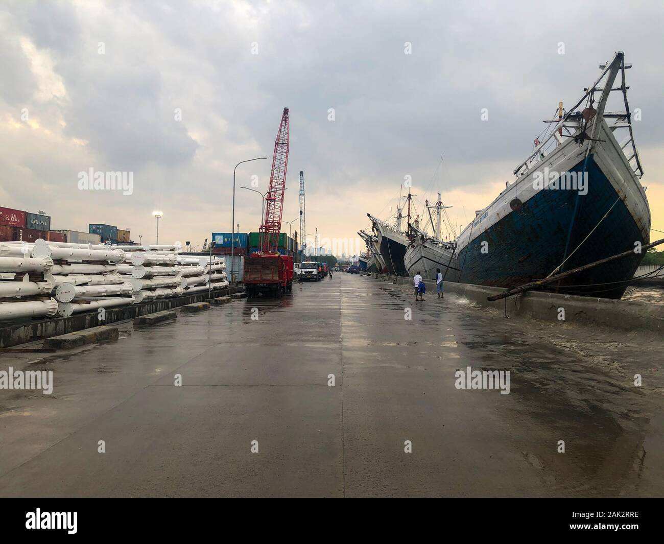 JAKARTA, INDONESIA, JANUARY 7 2020 : Traditional industrial port with ...