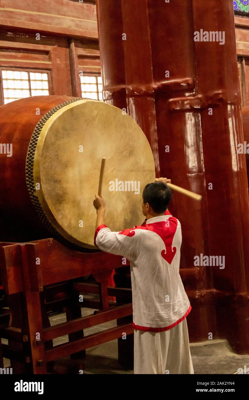 drummers performing for tourists at the Drum Tower of Beijing, China ...