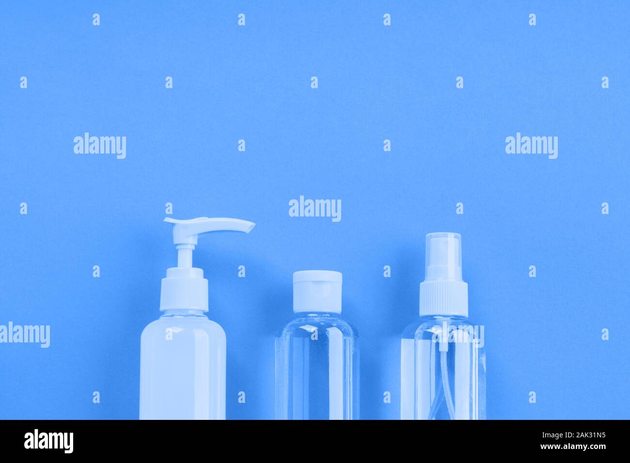 Generic beauty products on classic blue background Stock Photo - Alamy