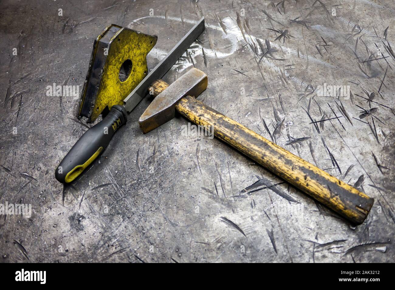 Tools for processing metal on the table Stock Photo - Alamy
