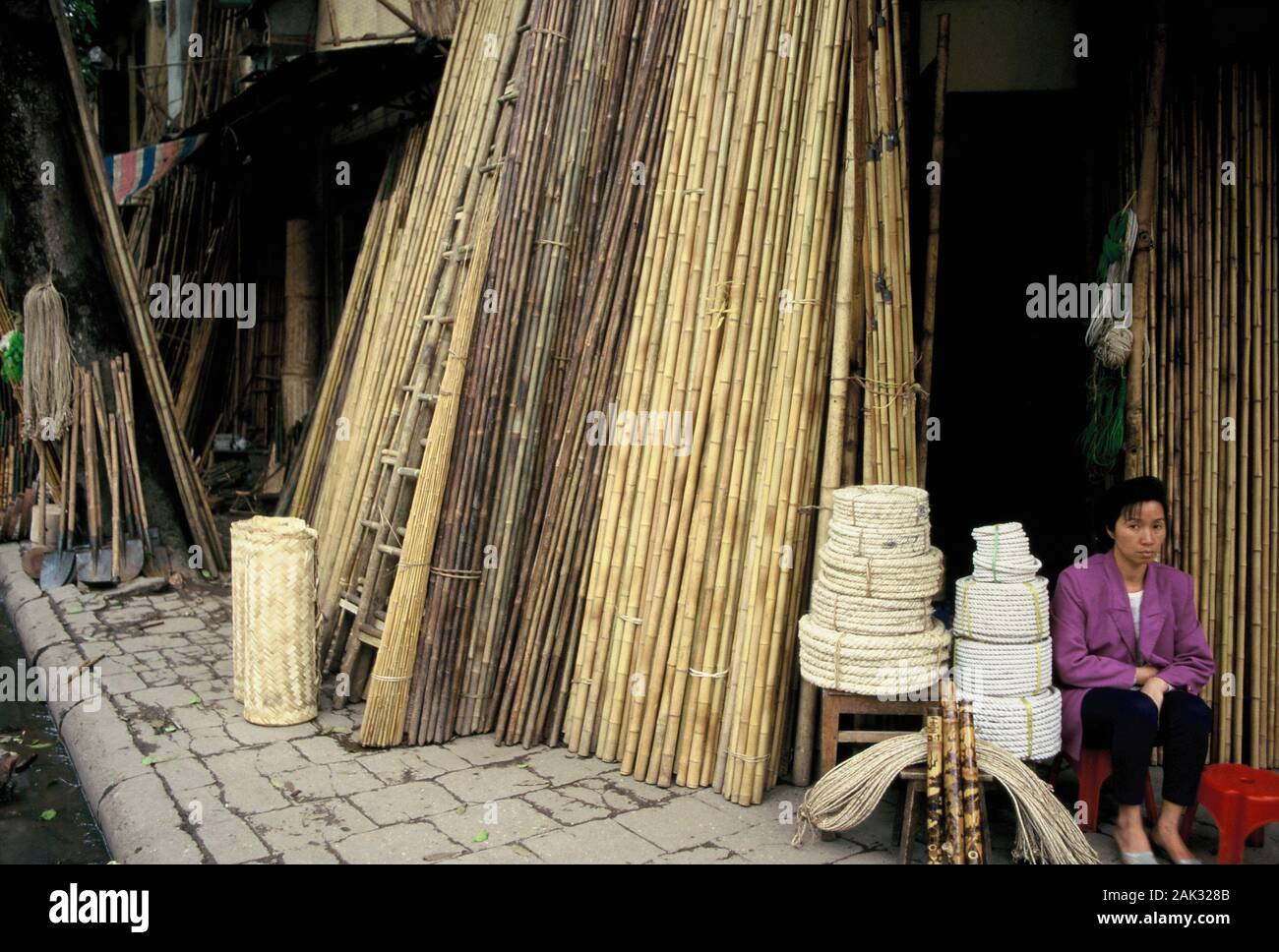 Large bamboo stacks are offered in a shop in the old town of Hanoi ...