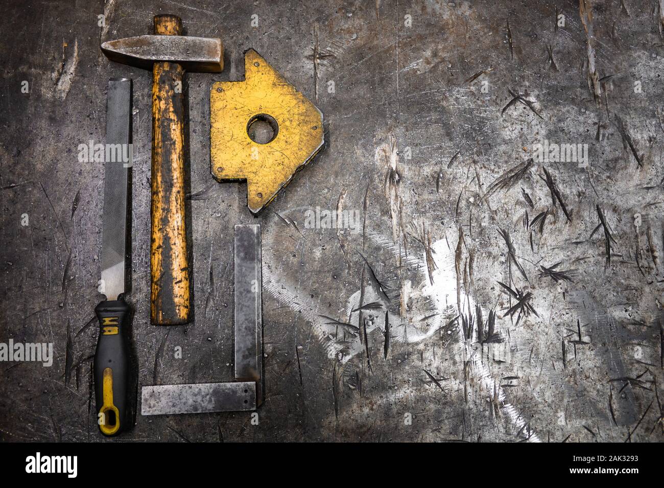Tools for processing metal on the table Stock Photo - Alamy
