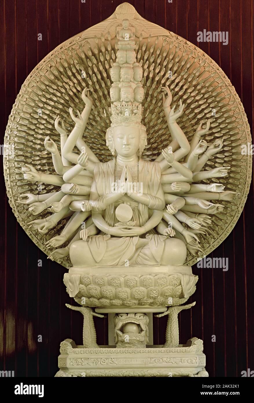 A statue of the thousand-arm Quan Am, a goddess of the Buddhist ...