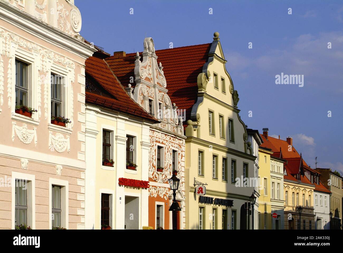 Baroque houses line the market place in Luckau in Brandenburg, Germany ...