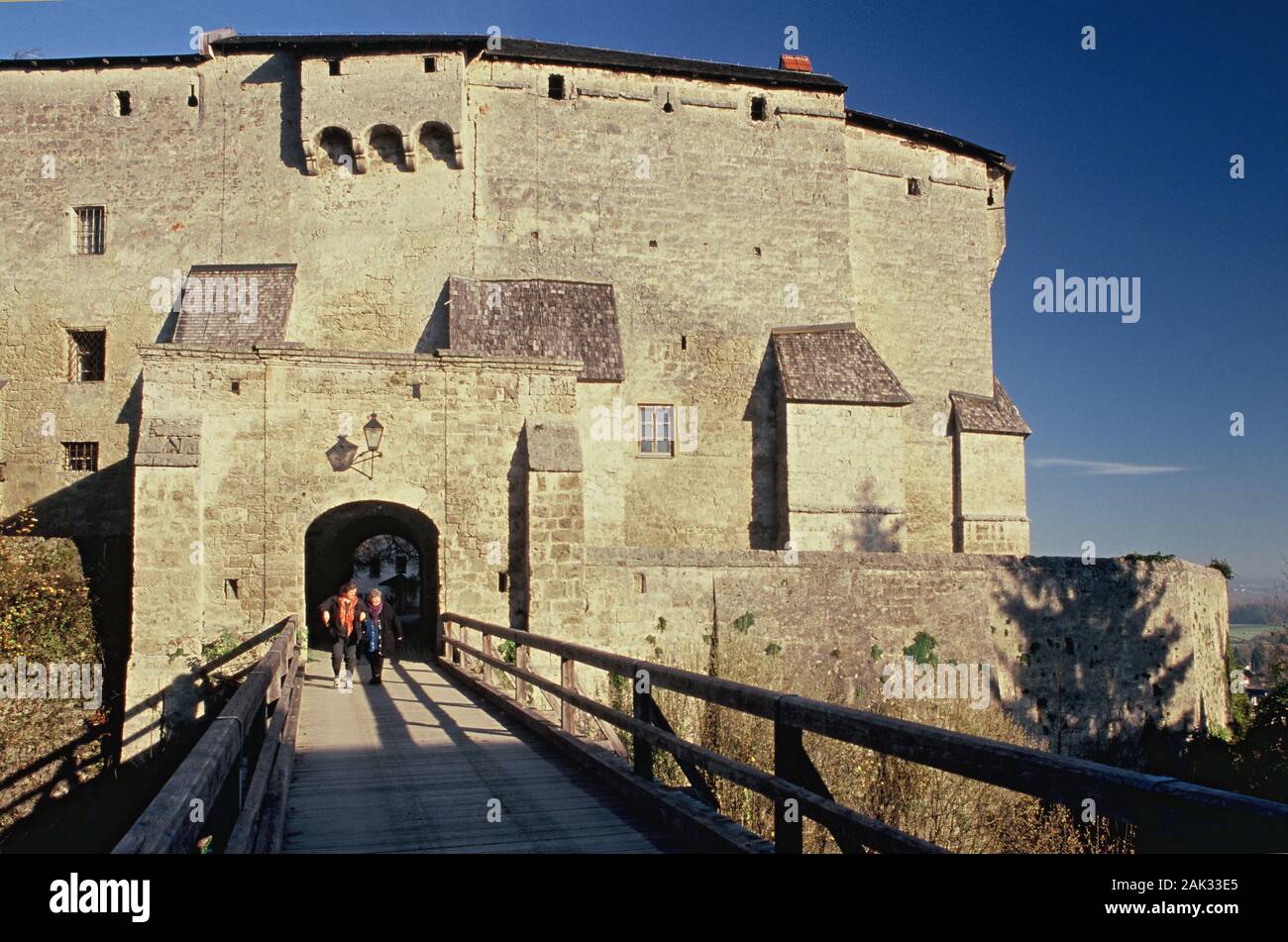 A bridge leads to the entrance of the grand medieval castle of ...