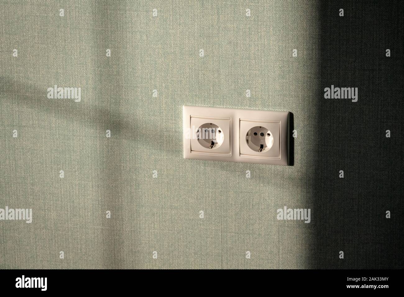Outlets on the wall of the living room Stock Photo - Alamy