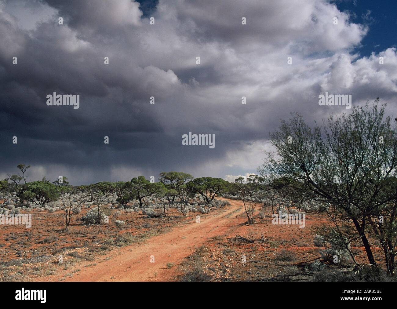 A thunder storm arrives to the Outback at the Stuart Highway in South ...