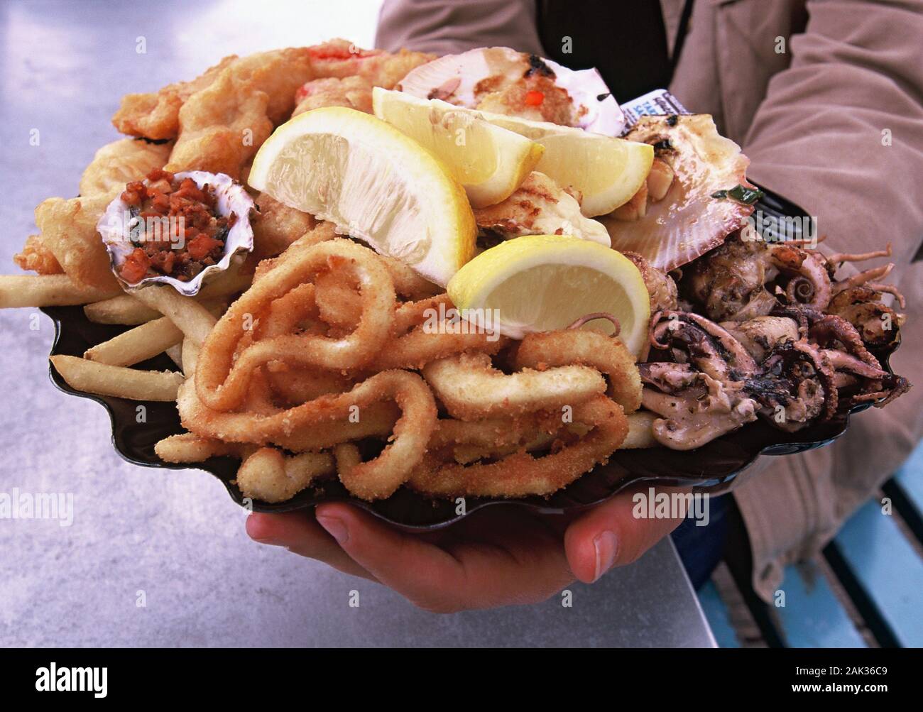 A plate with seafood delicacies is served in Sydney (New South Wales ...