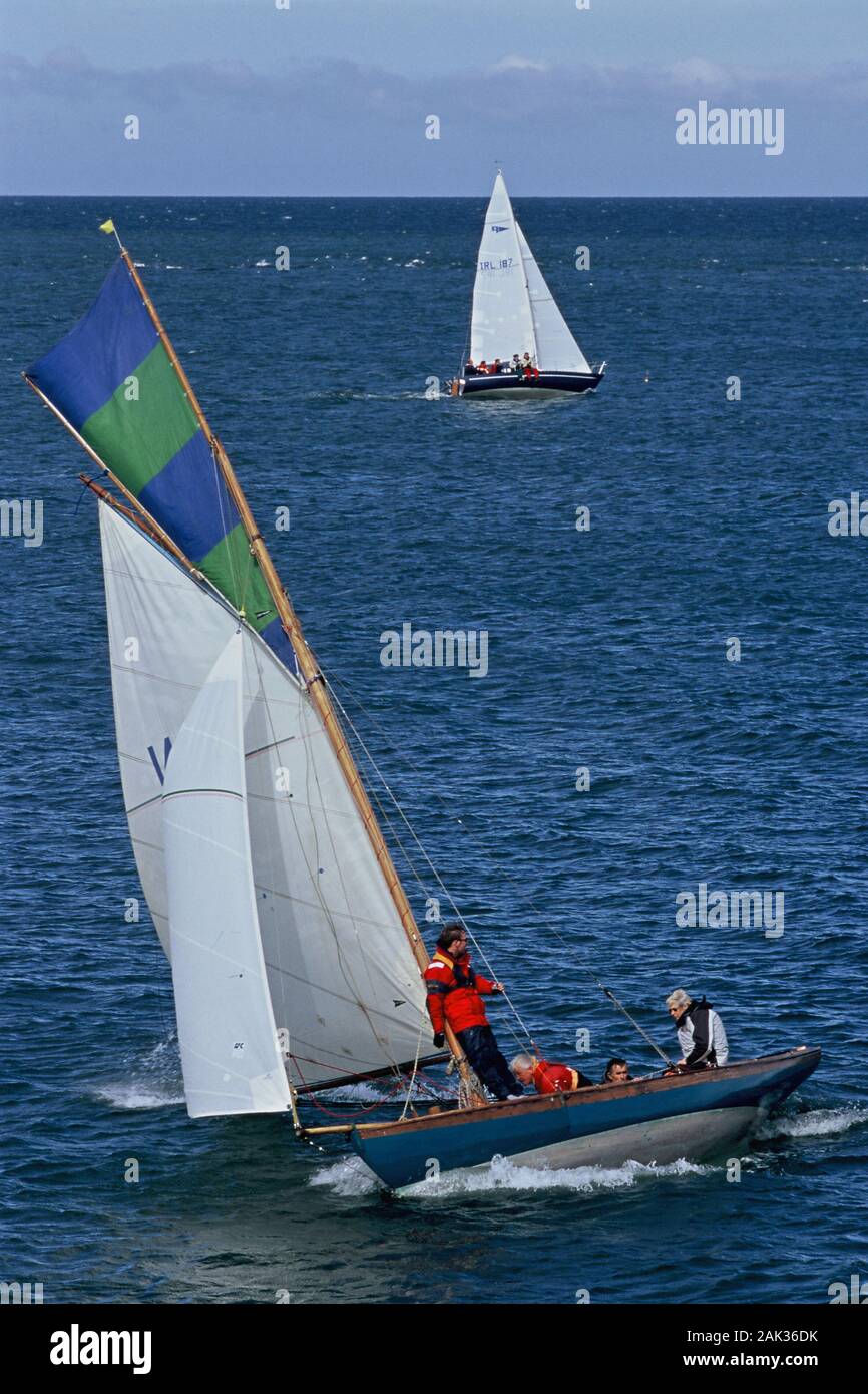 Sailing boats navigating at Howth Island in the east of Ireland on the ...