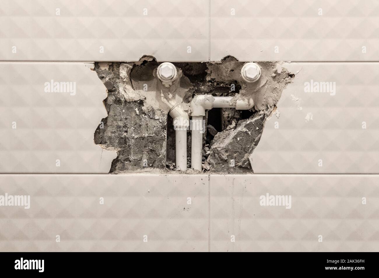 A hole in the wall during the construction period Stock Photo - Alamy