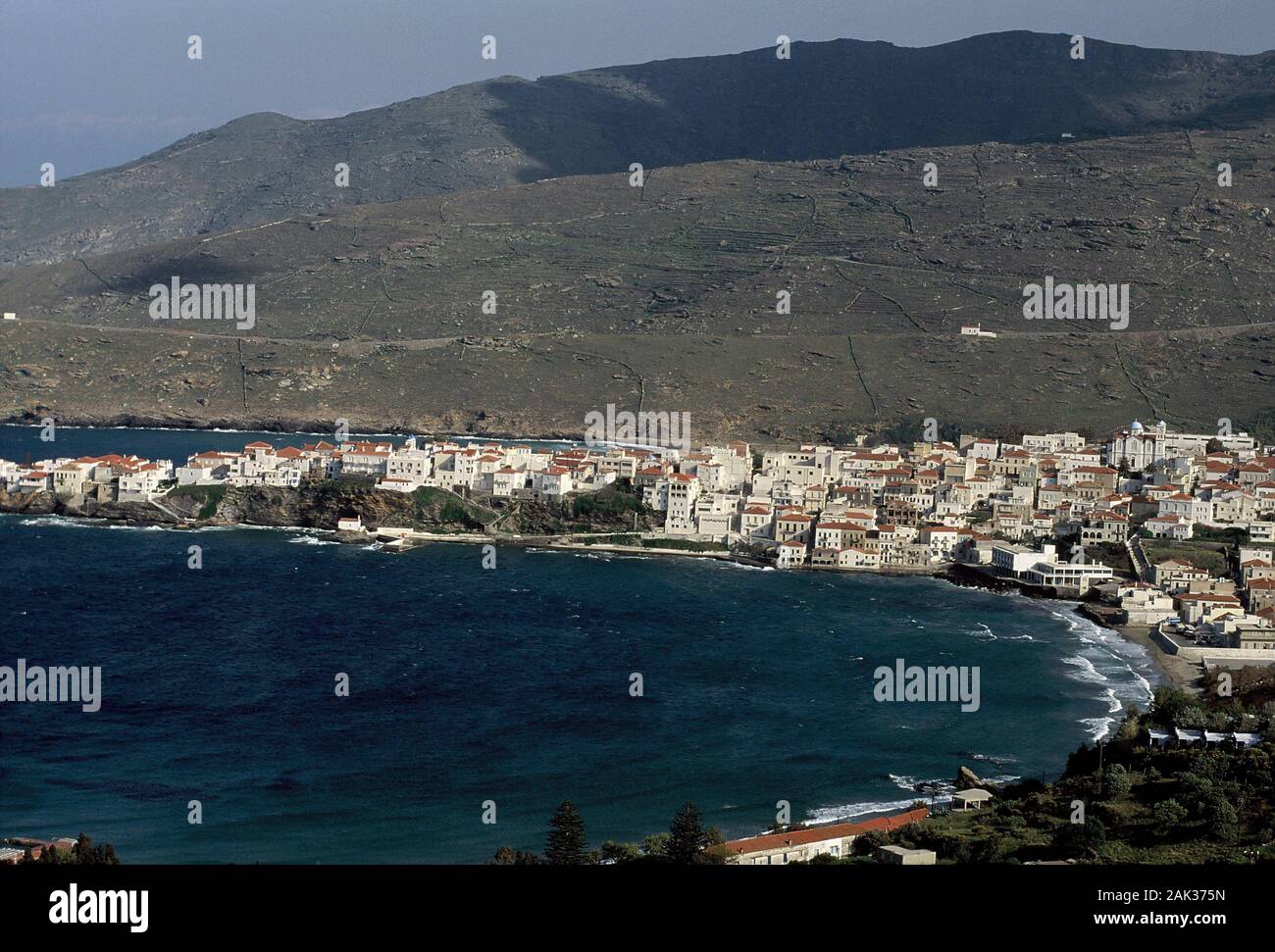 View of the bay with the capital city Andros on the island Andros ...
