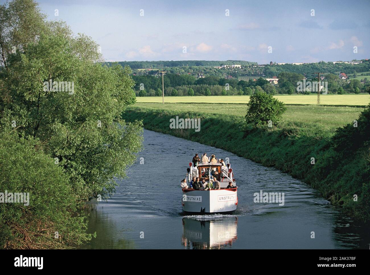 With several visitors on board the excursion boat Unstrutnixe navigates ...