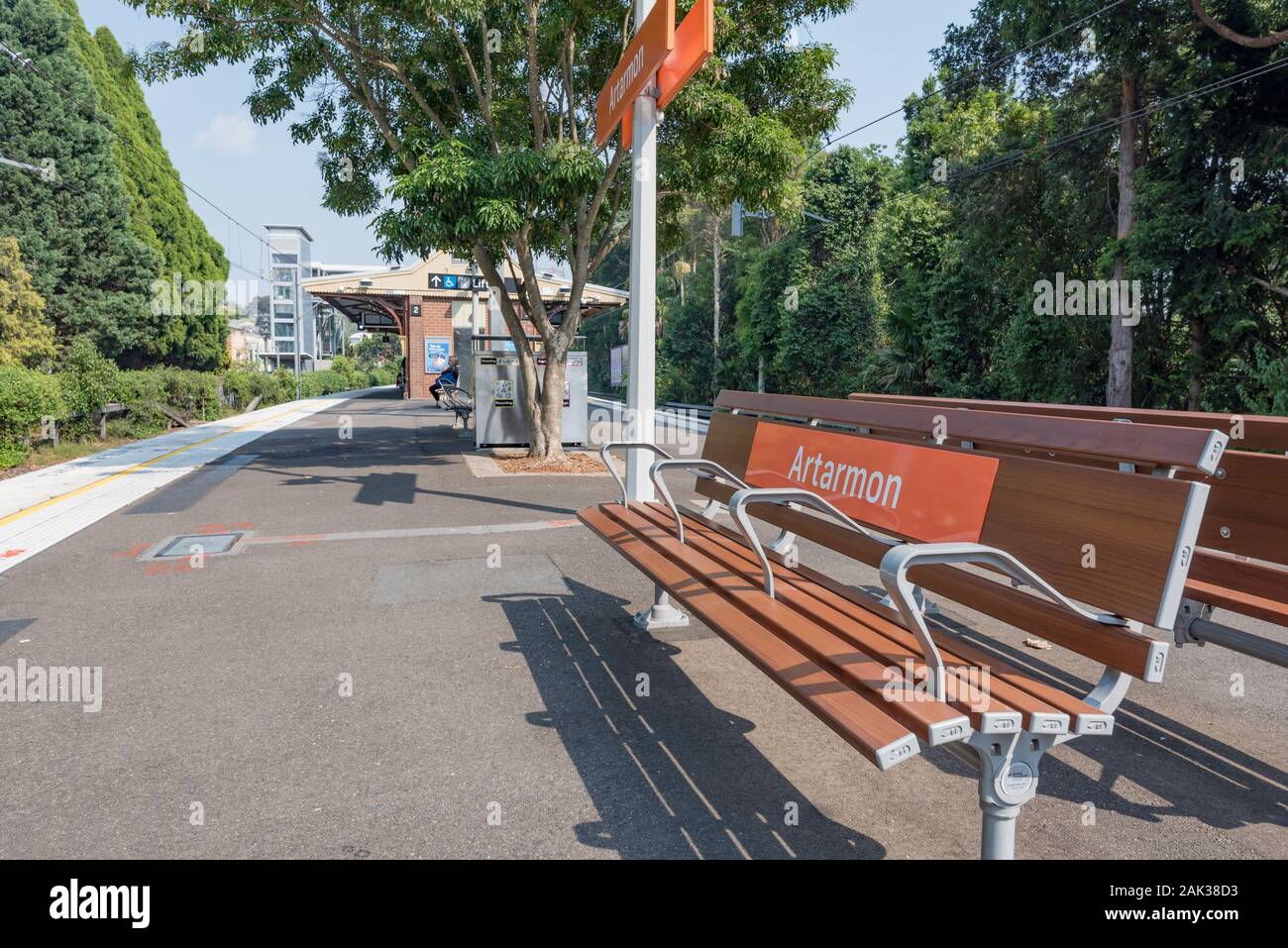 Modern seating and platform trees on Artarmon railway station, one of ...