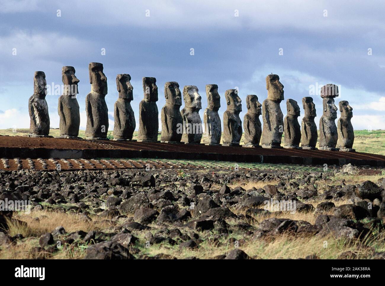 Several moai stand in line on the Ahu Tongaraki on the Easter Island ...
