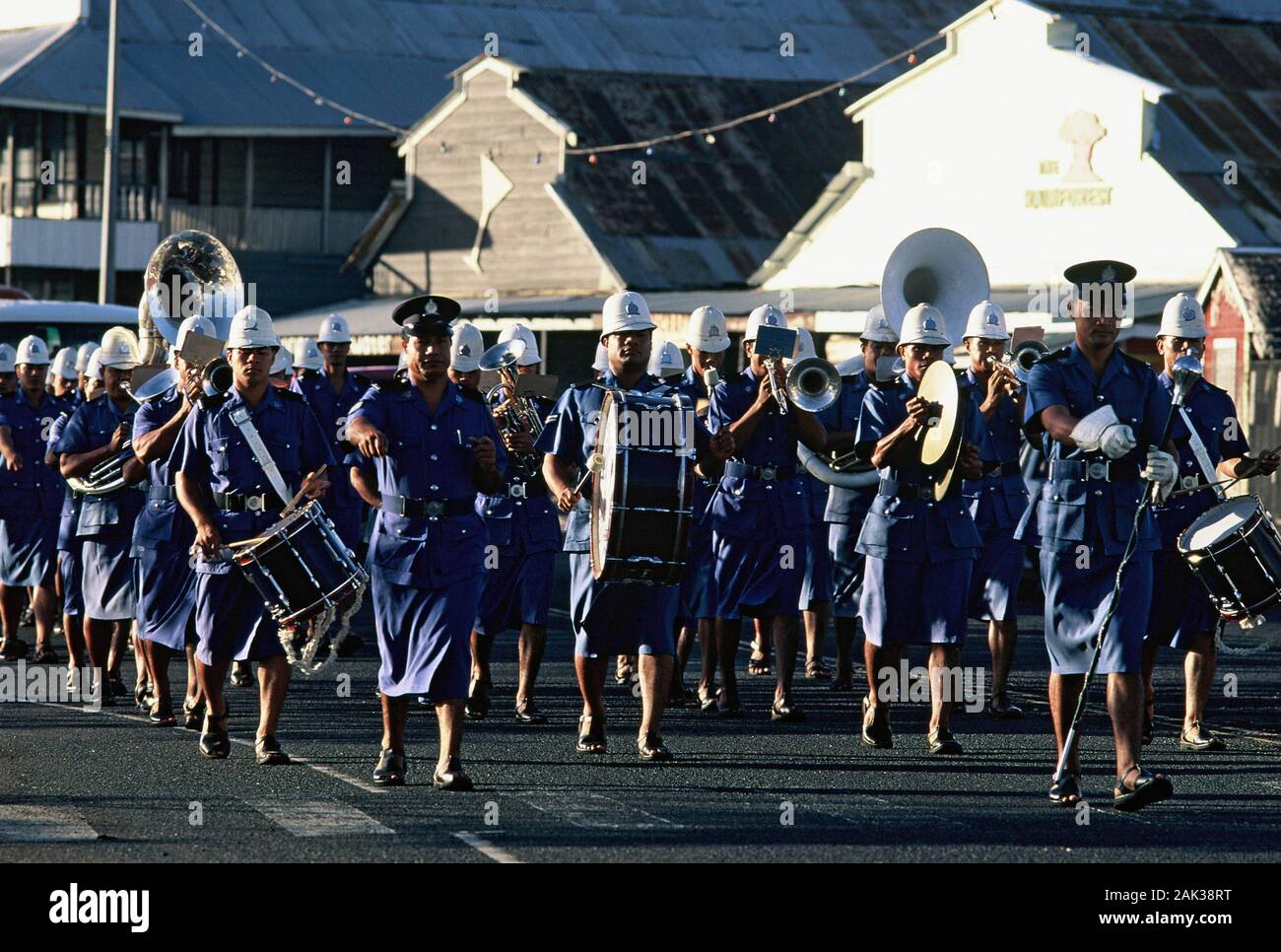Policemen walking through the streets of Apia during their every ...