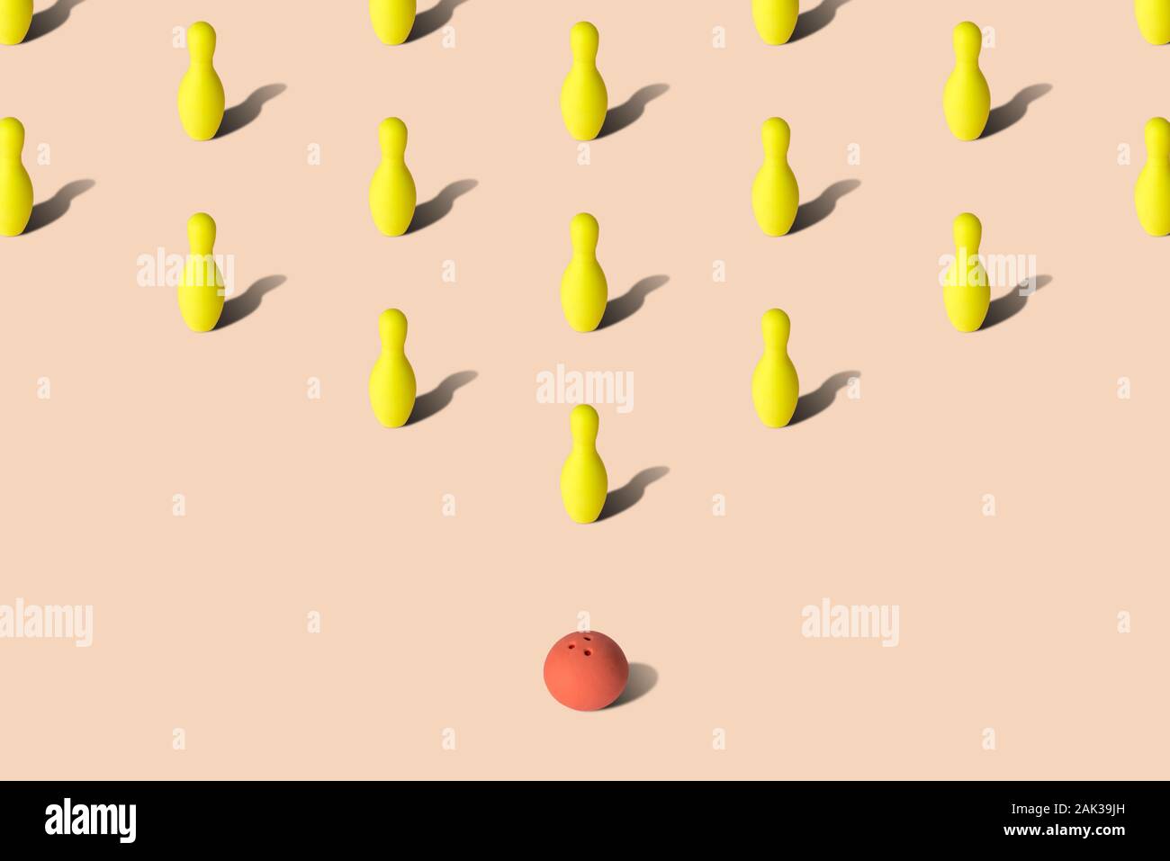 Red bowling ball and yellow bowling pins on pastel background sport ...