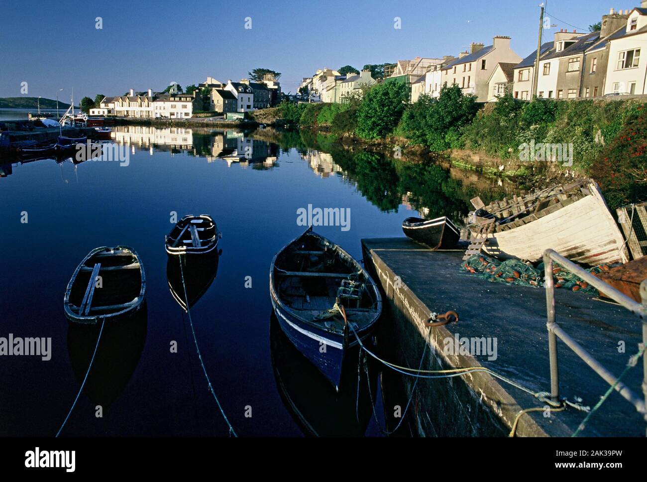Boats anchoring in front of the picturesque backdrop of the fishing ...
