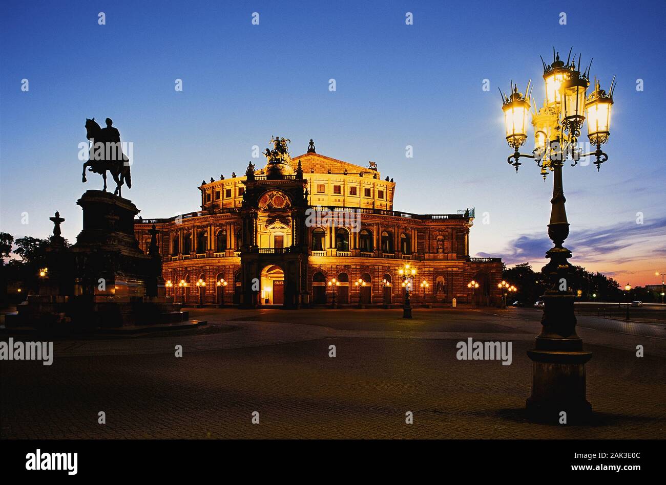 View of the illuminated Semper Opera House in Dresden at night. The ...