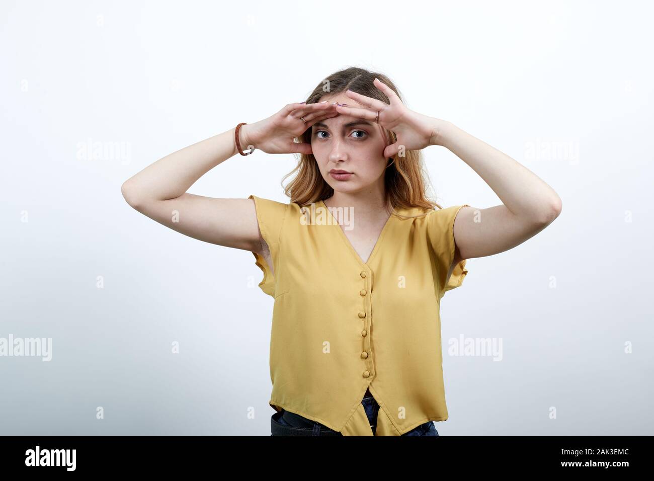 Attractive blonde girl looking distance hi-res stock photography and ...