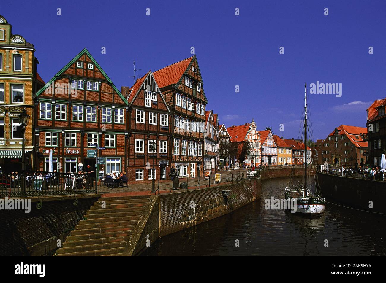 The old port in Stade with the street Wasser West is lined by restored ...