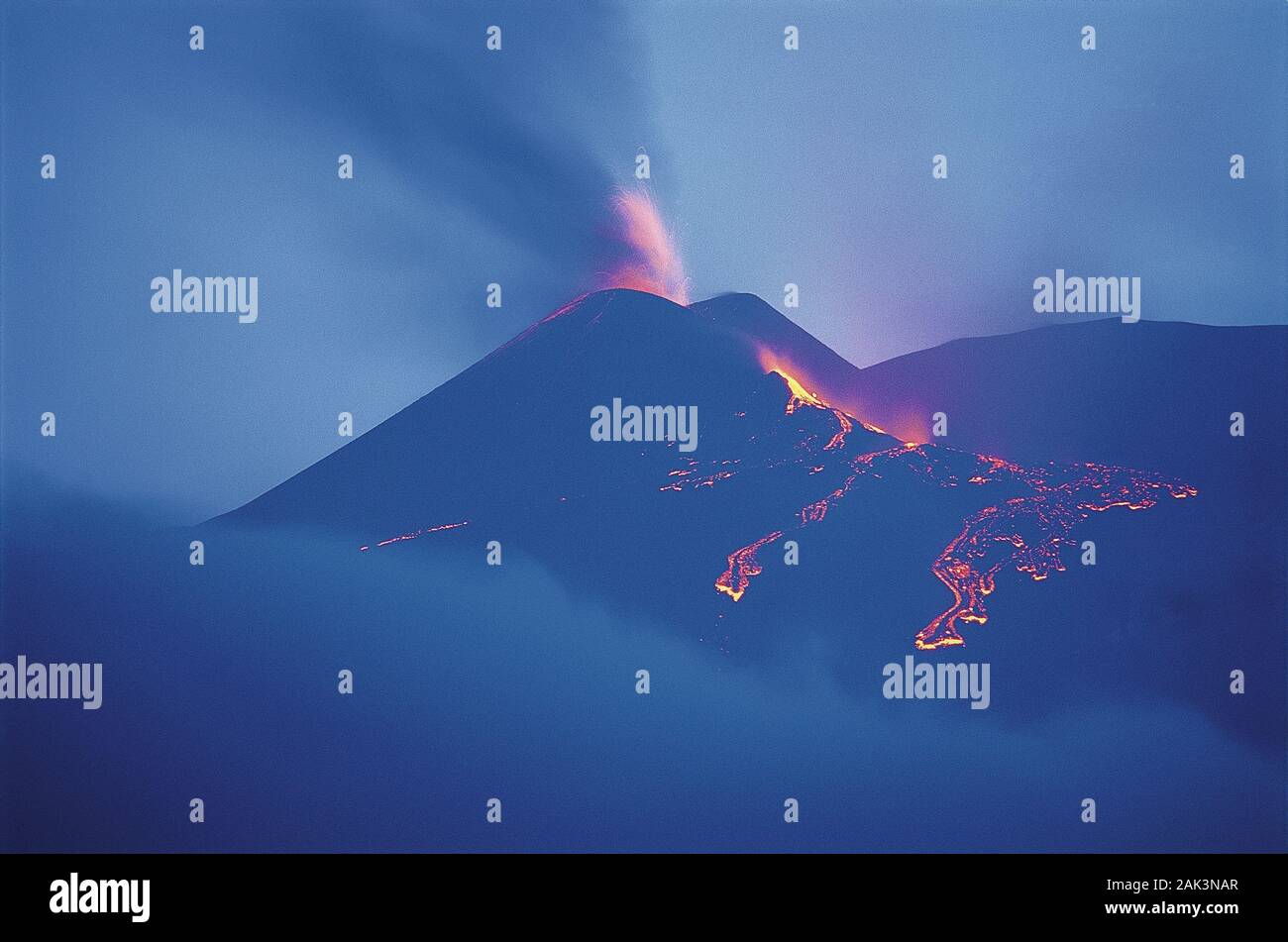 Volcanic erption at the Aetna on Sicily in Mai 2001. Streams of lava ...