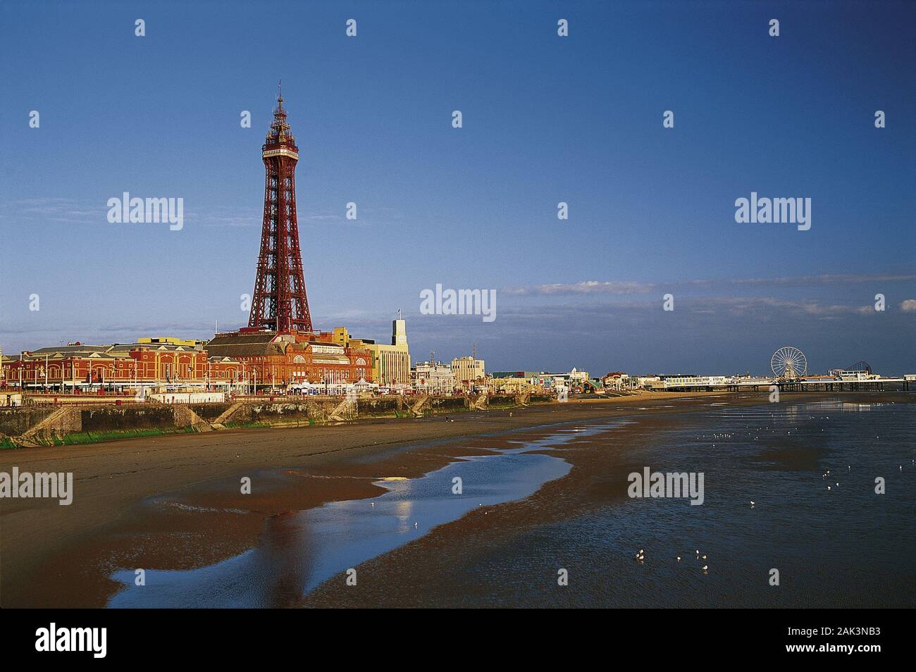The sea bridge with the tower, the beach and the fairground are typical ...