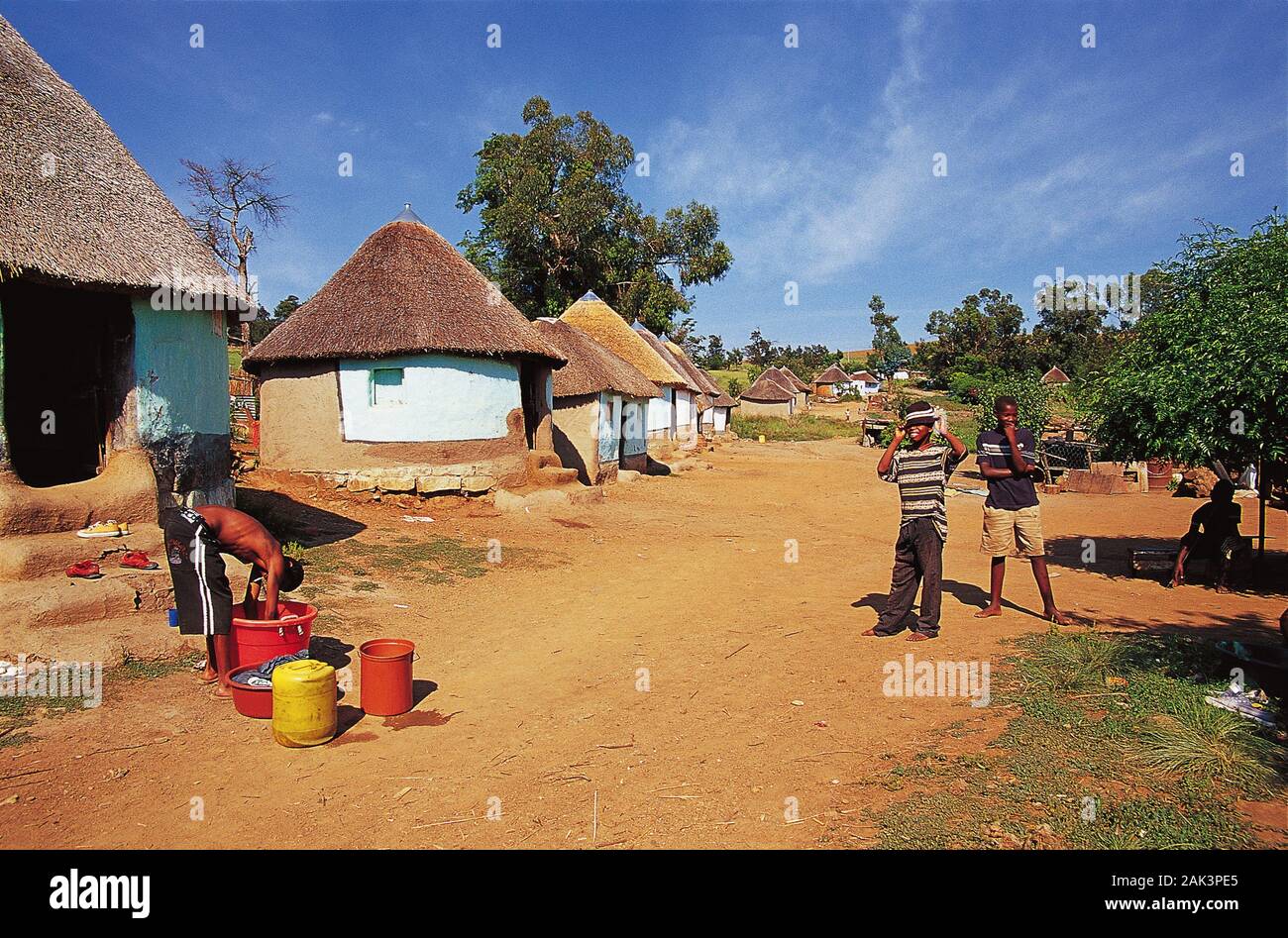 A photo of residents and their huts of the Zulu settlement at the N2 ...